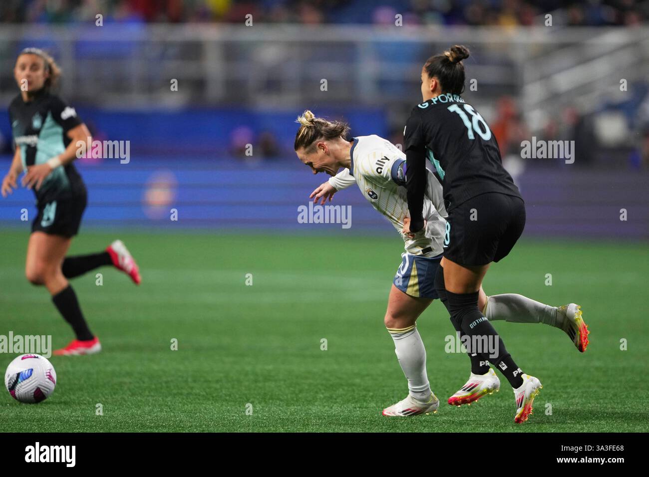 Seattle Reign FC midfielder Jess Fishlock (10) is fouled by NJ/NY ...