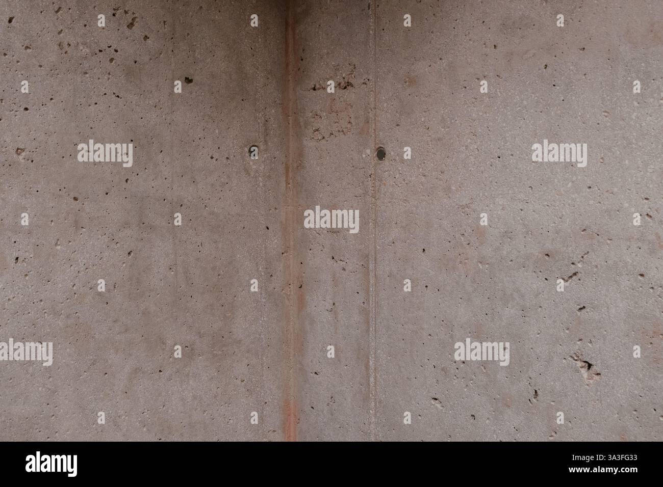 Concrete wall: Raw concrete surface with varied textures small holes ...