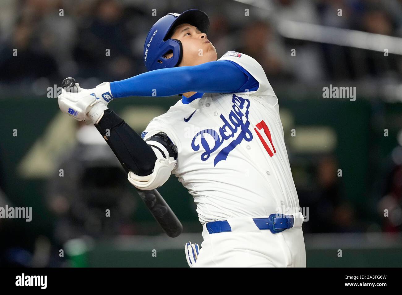 Los Angeles Dodgers' Shohei Ohtani flies out against the Hanshin Tigers ...