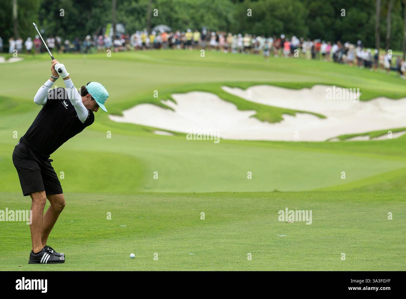 Captain Joaquín Niemann of Torque GC hits his shot from the fairway on ...