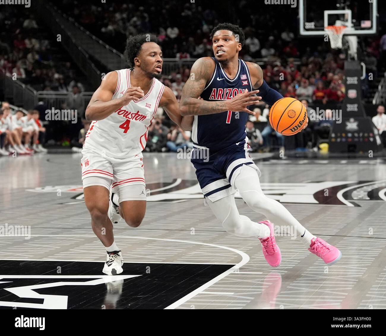 MAR 15 2025: Arizona Wildcats guard Caleb Love (1) drives to the basket ...