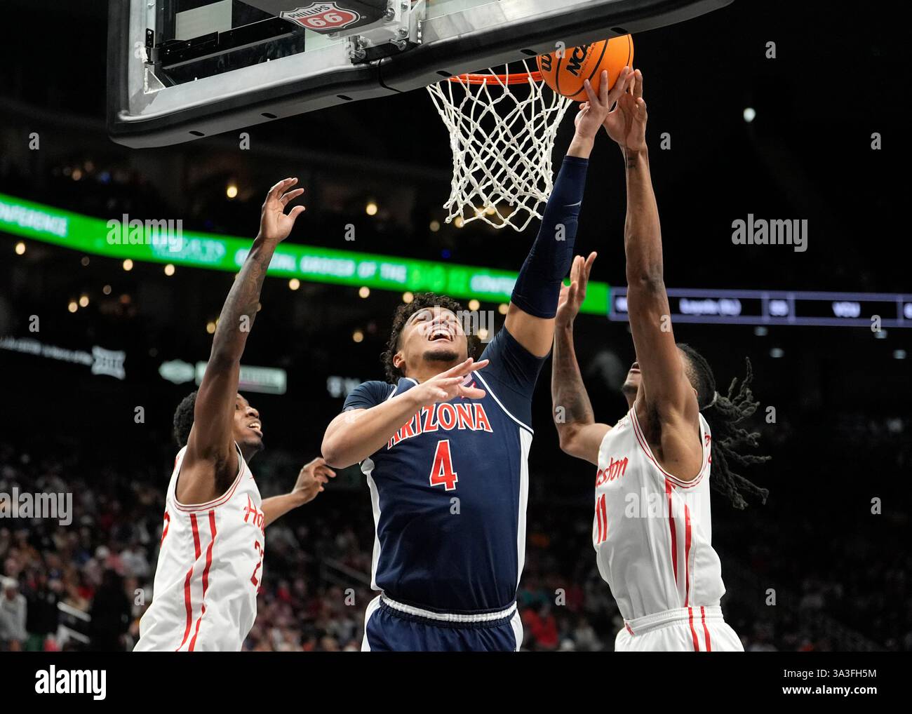 MAR 15 2025: Arizona Wildcats forward Trey Townsend (4) puts up a shot ...