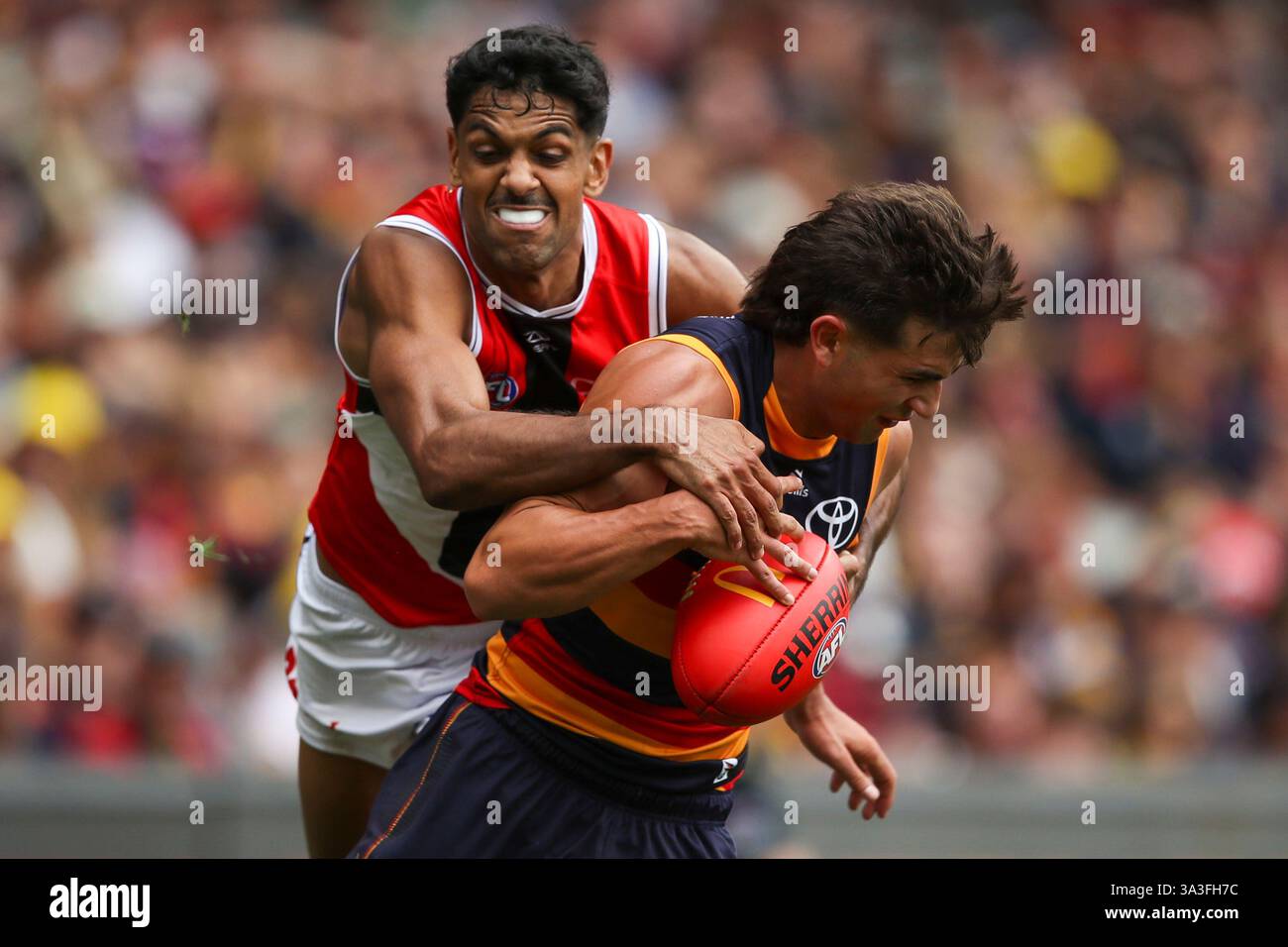 Josh Rachele of the Crows is tackled by Nasiah Wanganeen-Milera of the Saints during the AFL ...