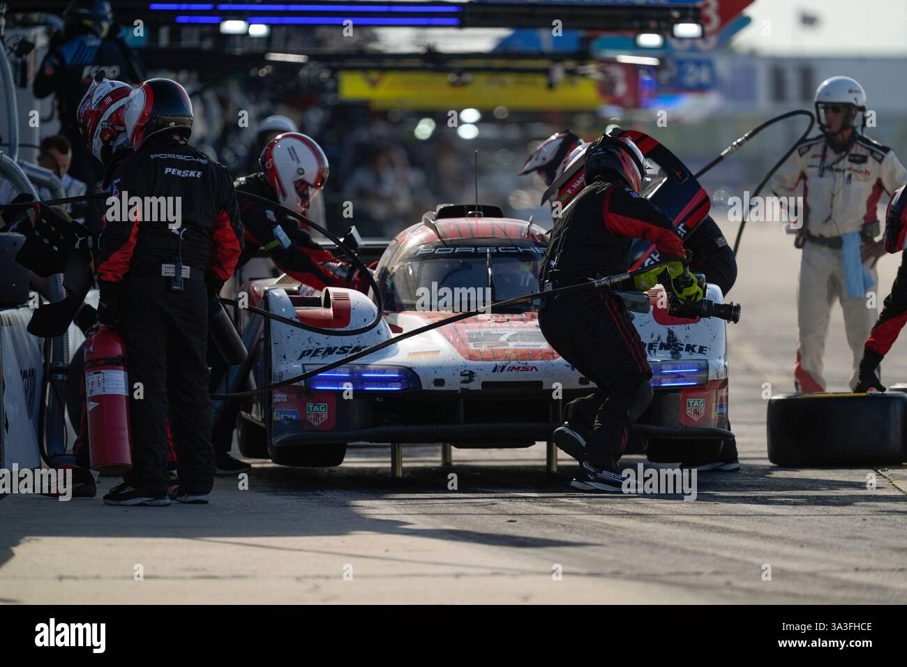 Sebring, Florida, USA. 15th Mar, 2025. Pit stop for the #7: Porsche ...
