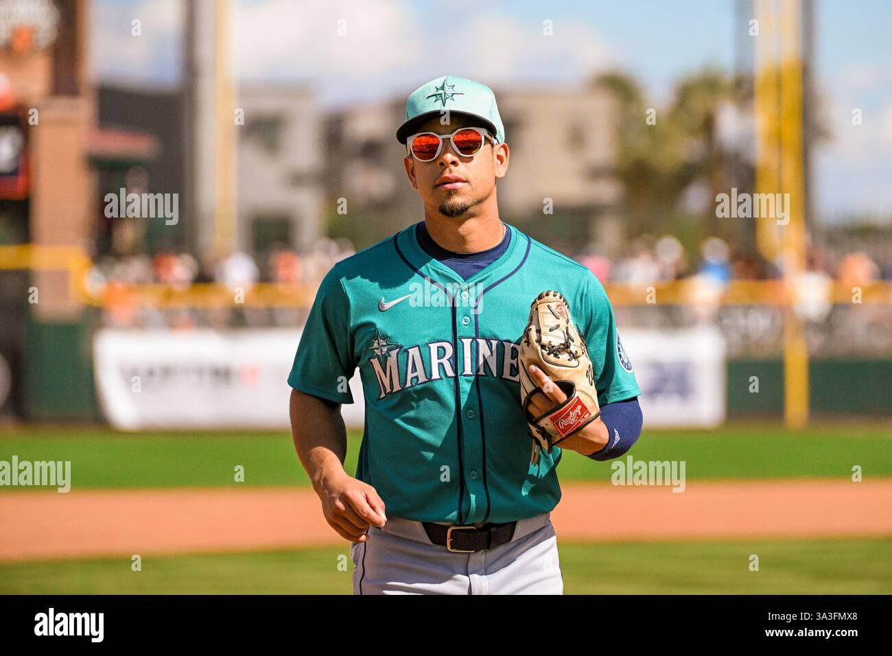 Seattle Mariners shortstop Leo Rivas (76) jogs off the field in the ...
