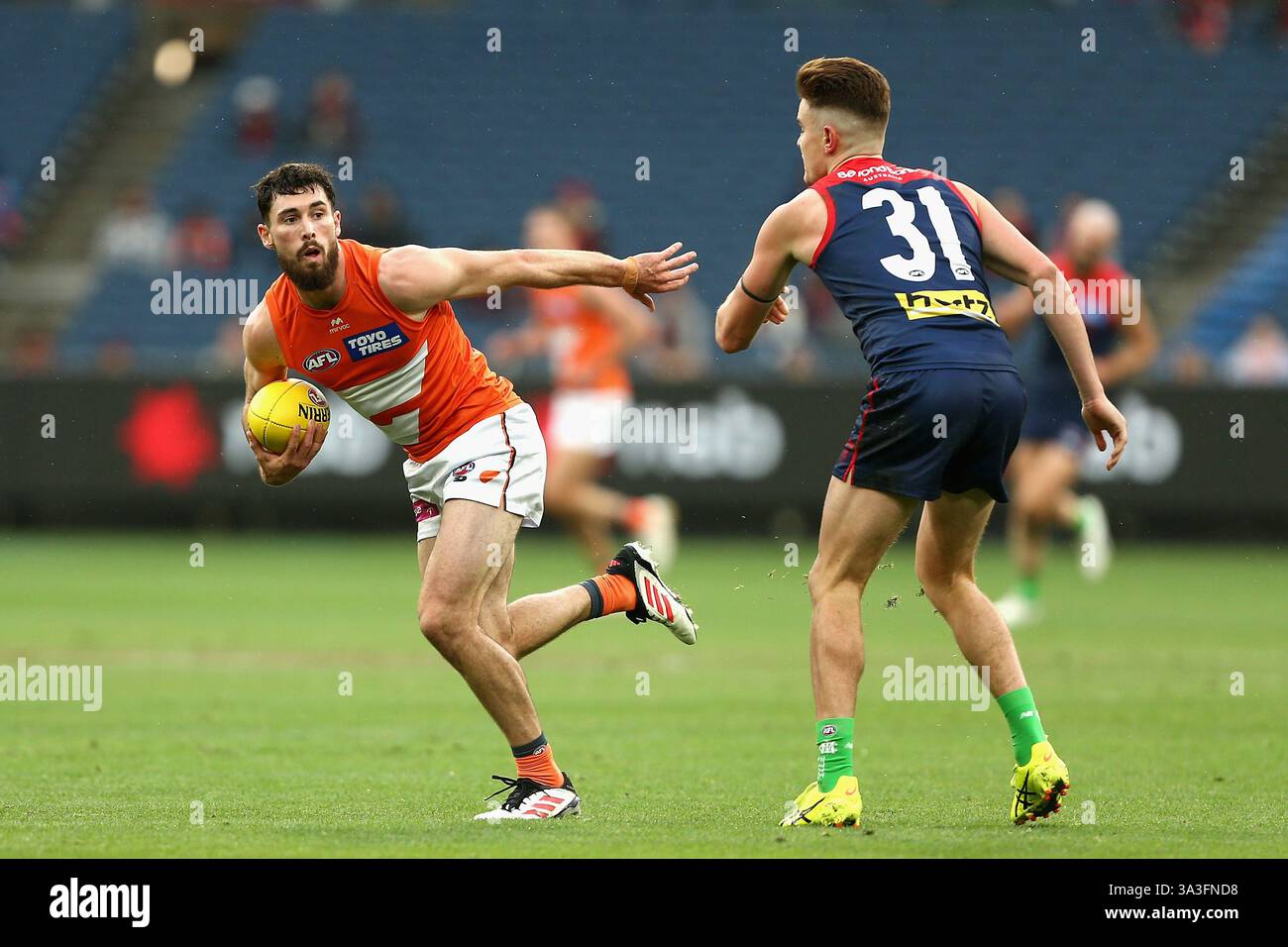 Melbourne, Australia. 16th Mar, 2025. Lachie Ash of the Giants takes a ...