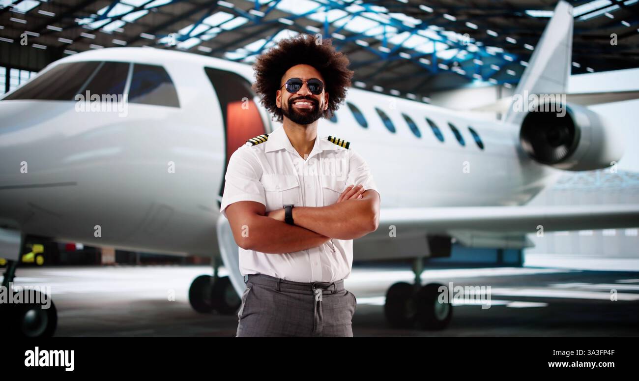 Smiling African American Pilot Prepares for International Charter ...