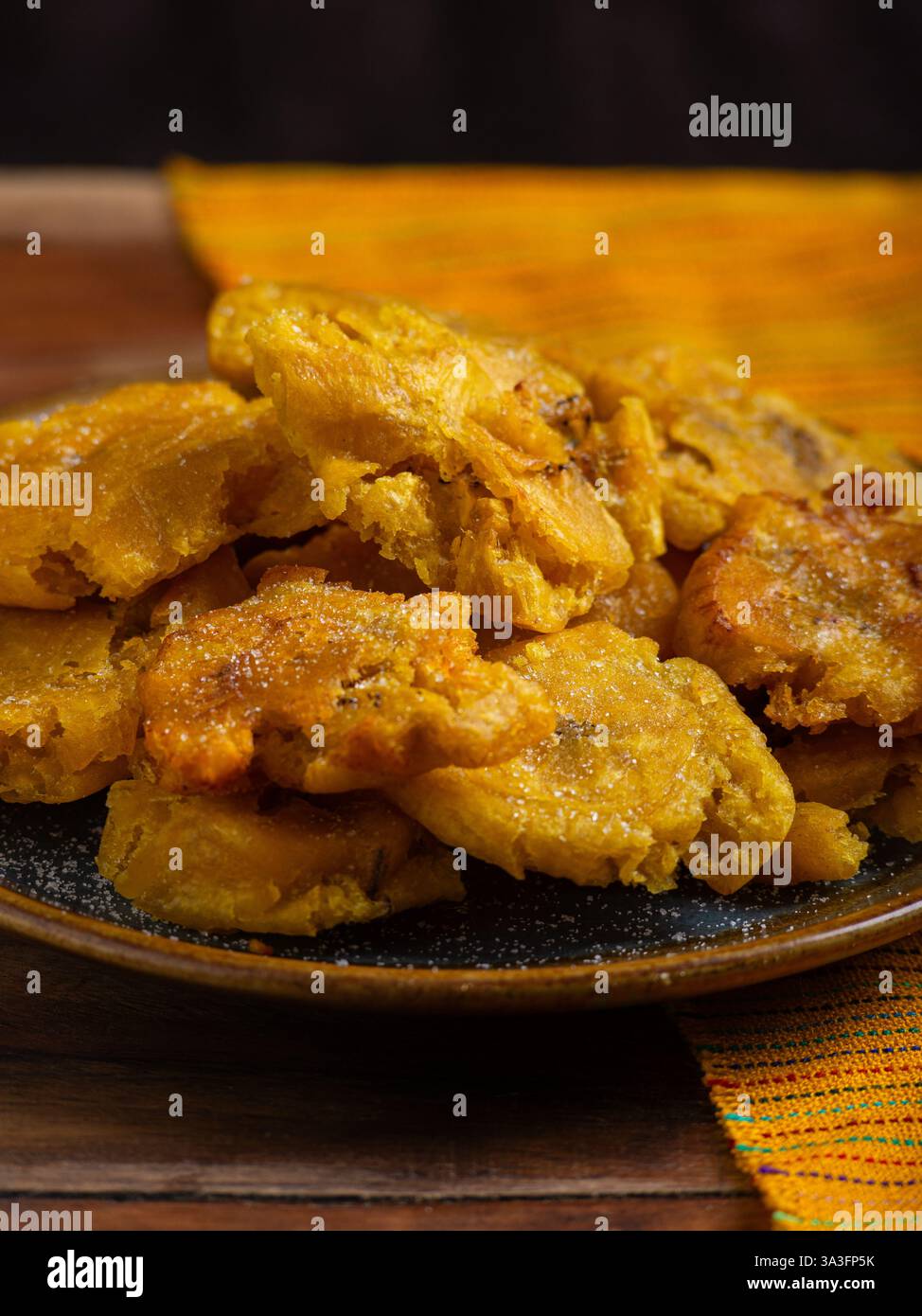 Plate full of tostones. Fried plantain, typical cuban food Stock Photo ...