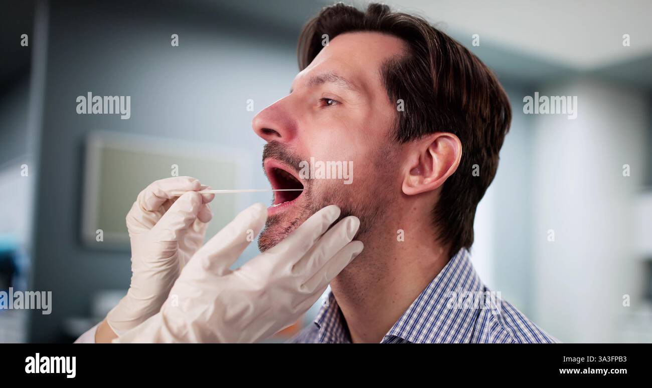 Medical Professional administering mouth swab DNA test for disease ...