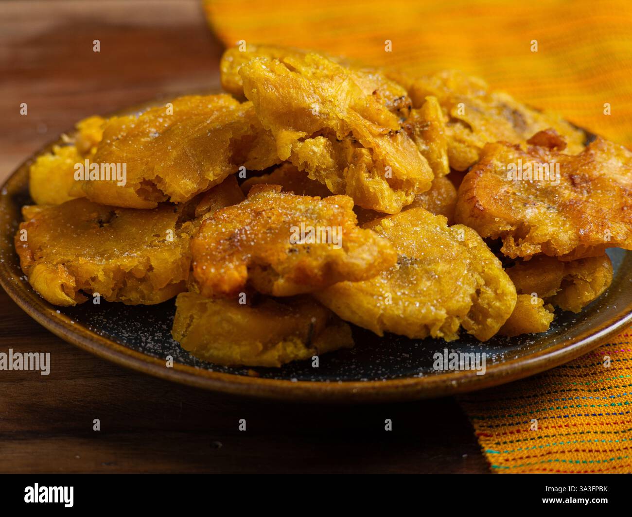 Plate full of tostones. Fried plantain, typical cuban food Stock Photo ...