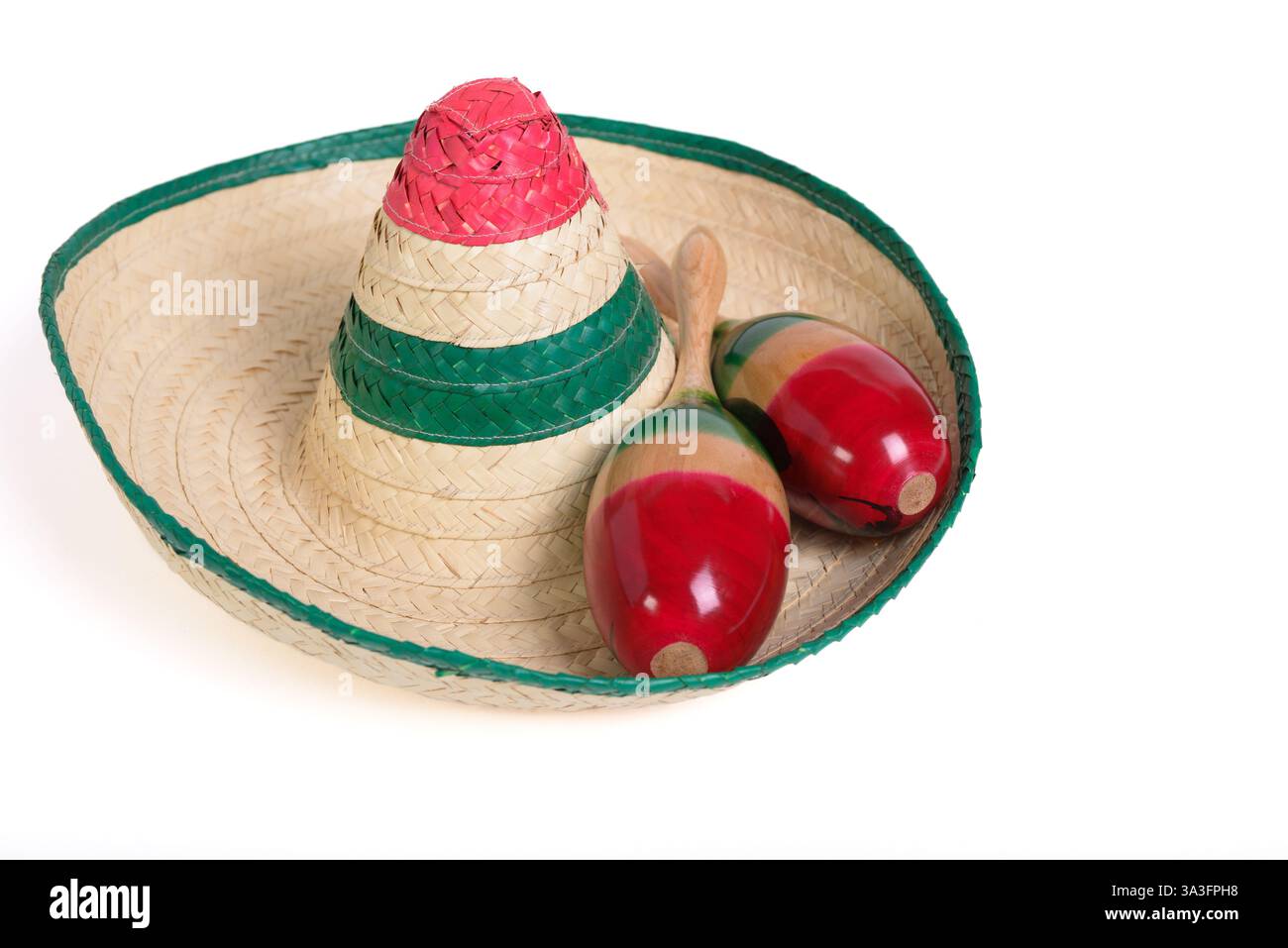 Mexican hat and maracas isolated on white background Stock Photo - Alamy