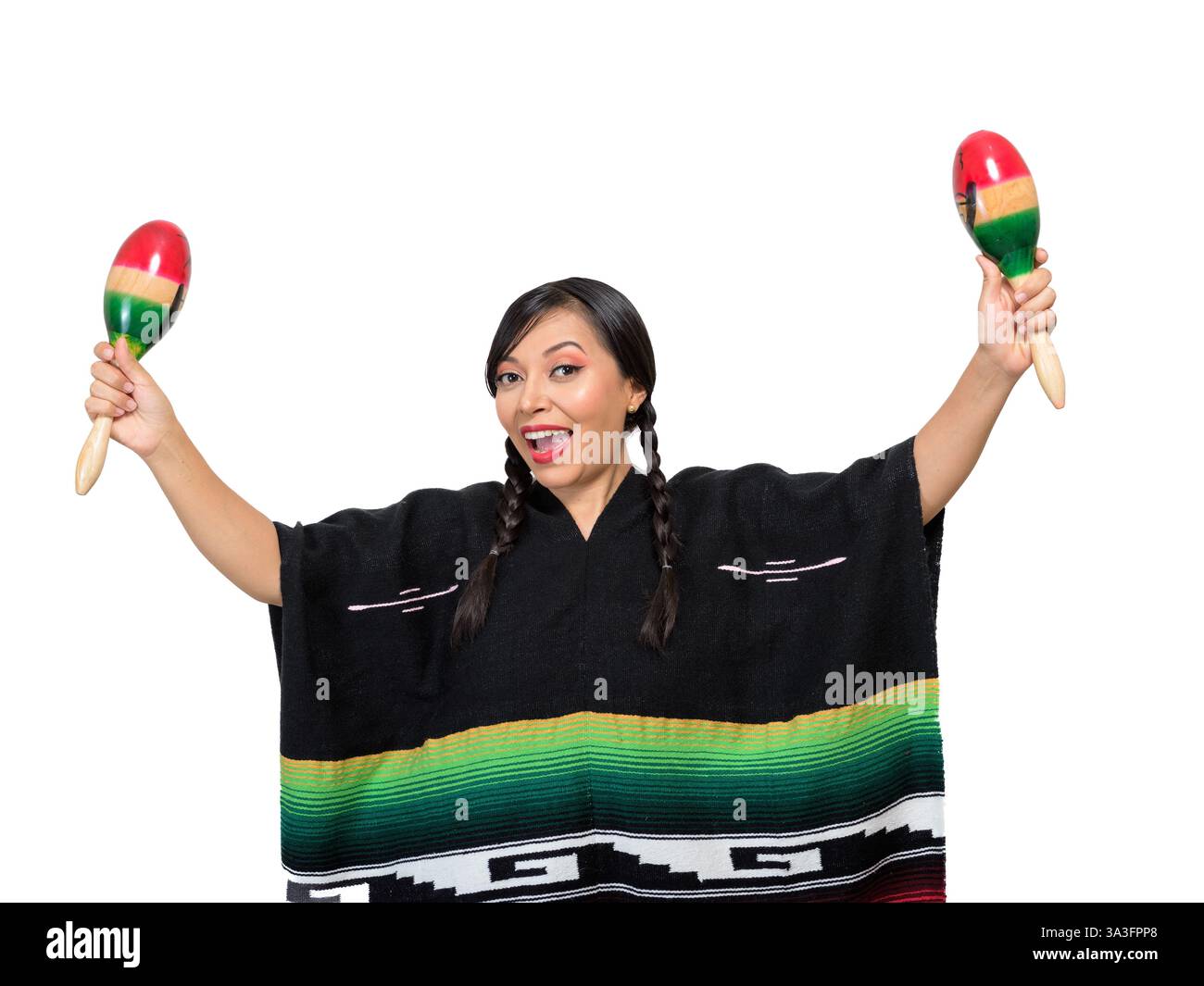 Mexican woman wearing colorful poncho plays maracas with positive ...