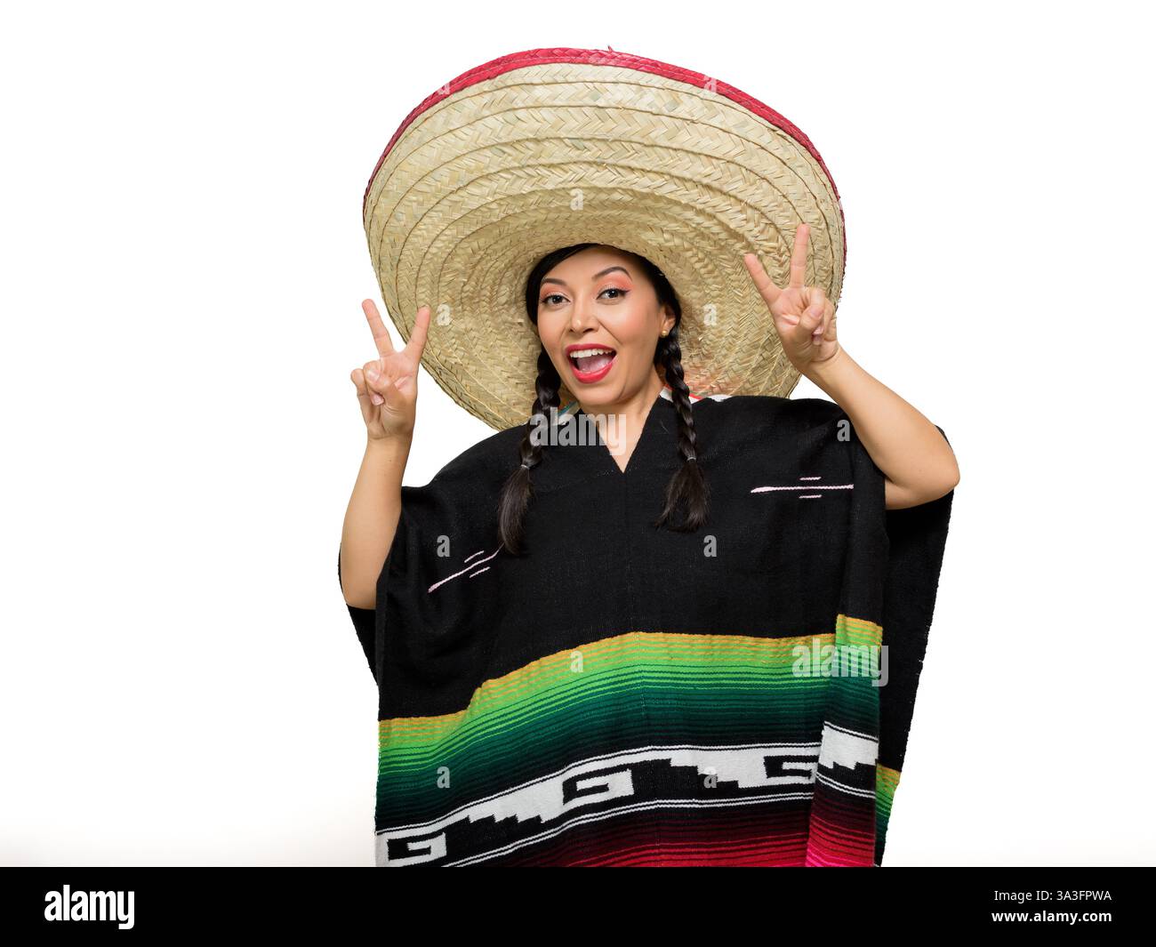 Smiling Mexican woman wears colorful poncho and big hat, isolated on ...