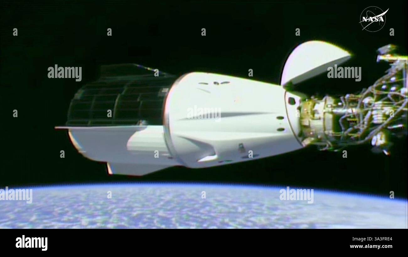 This image made from video by NASA shows the docking of the SpaceX ...