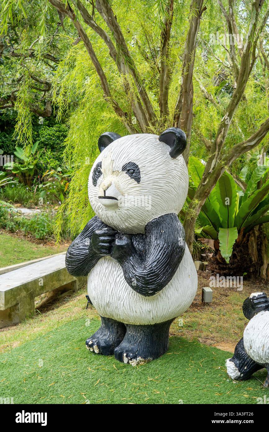 A panda statue is a sculpted representation of a giant panda, often ...