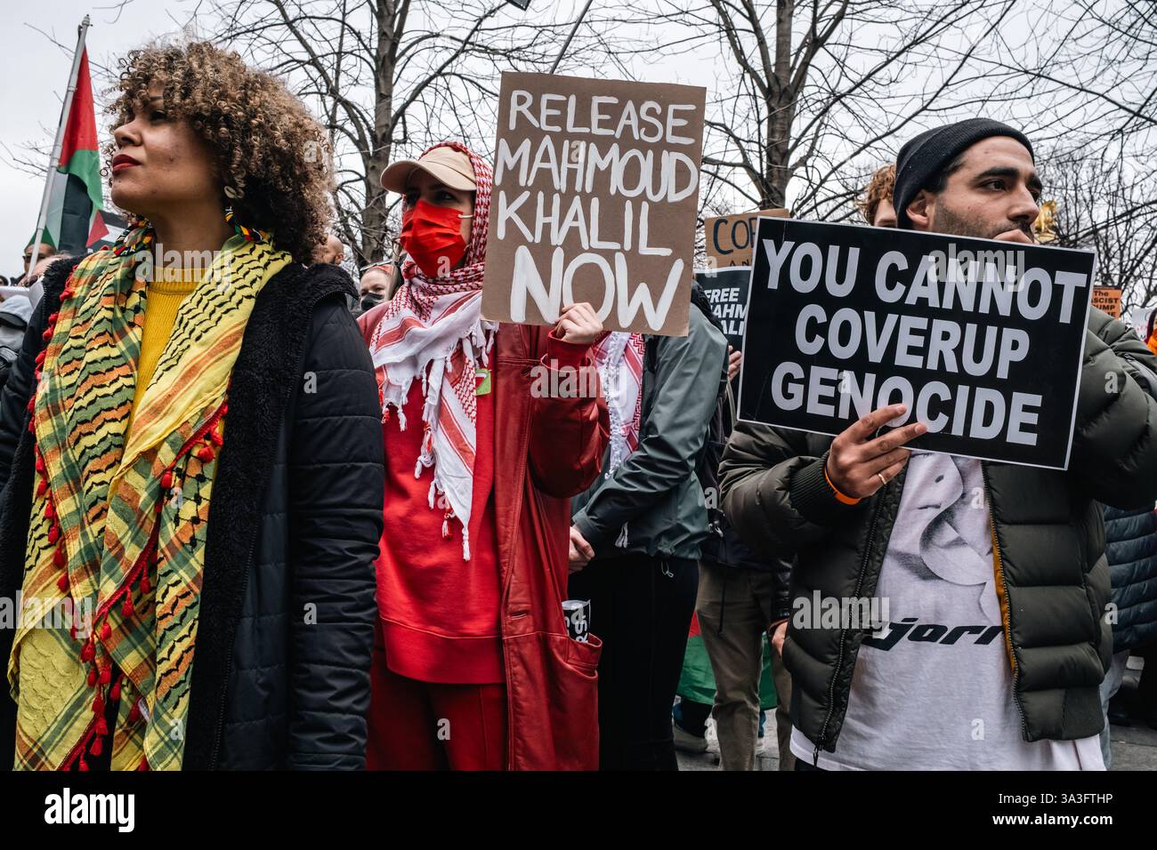 New York, USA. 15th Mar, 2025. Protesters hold placards expressing ...