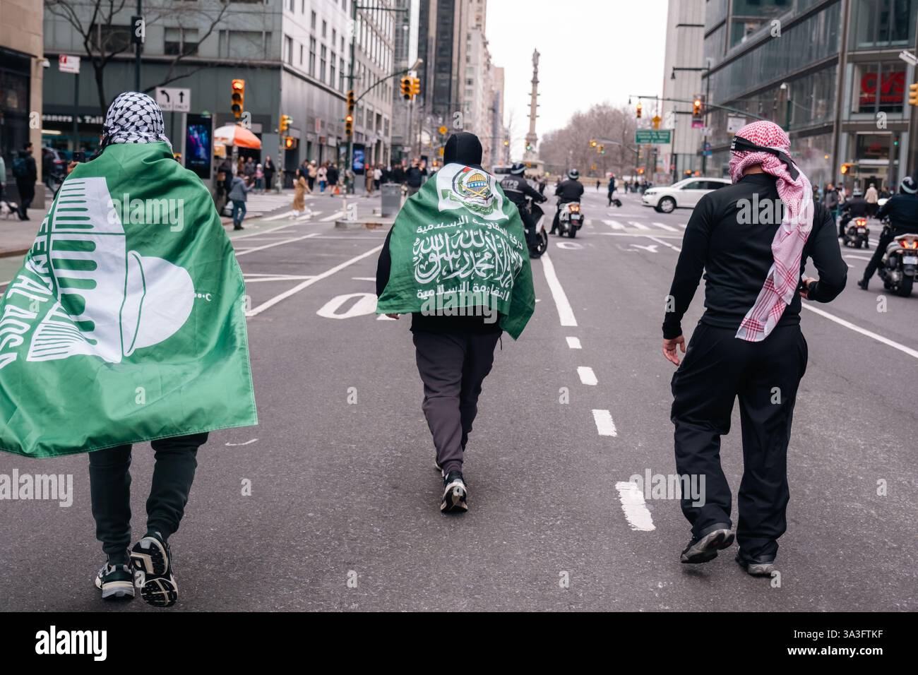 New York, USA. 15th Mar, 2025. Protesters wearing Keffiyehs to mask ...
