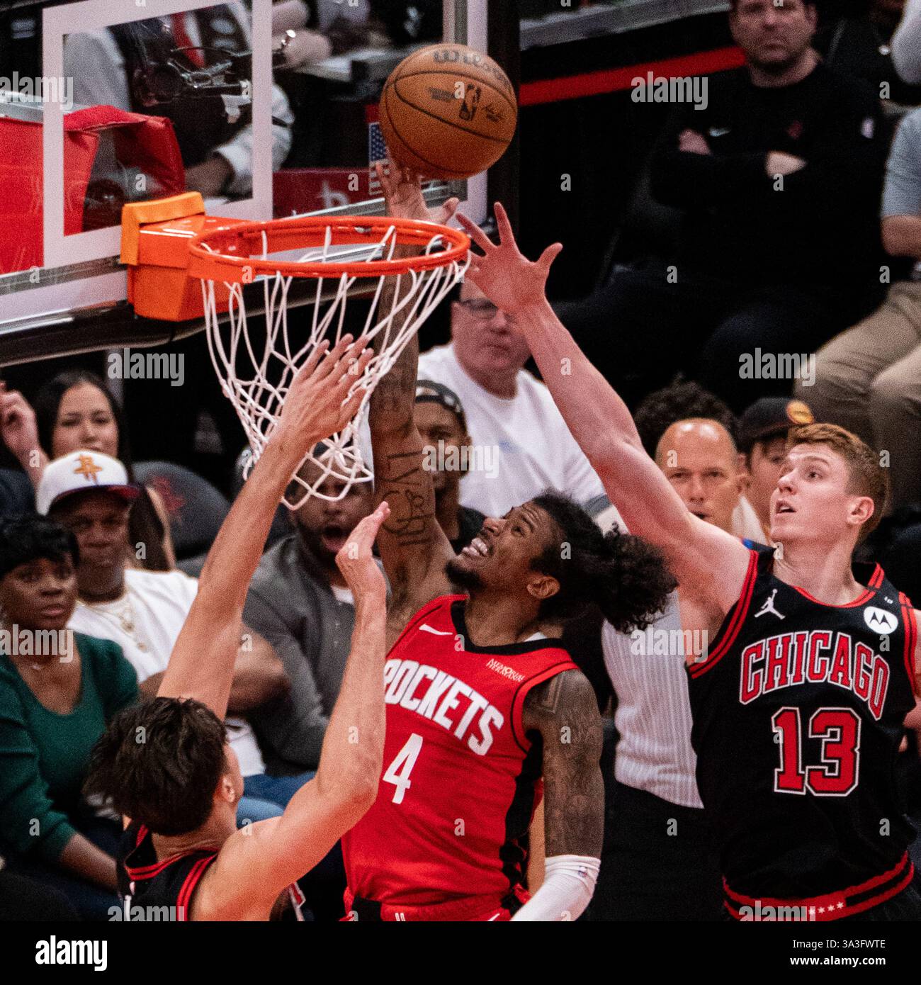 Houston, USA. 15th Mar, 2025. Jalen Green (C) of Houston Rockets goes ...
