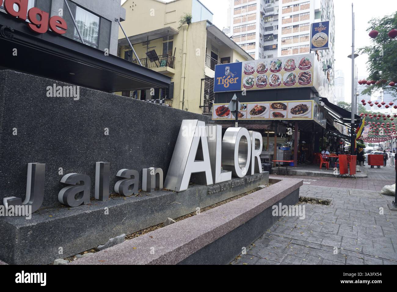 Jalan Alor sign. Jalan Alor is a famous tourist street food attraction ...