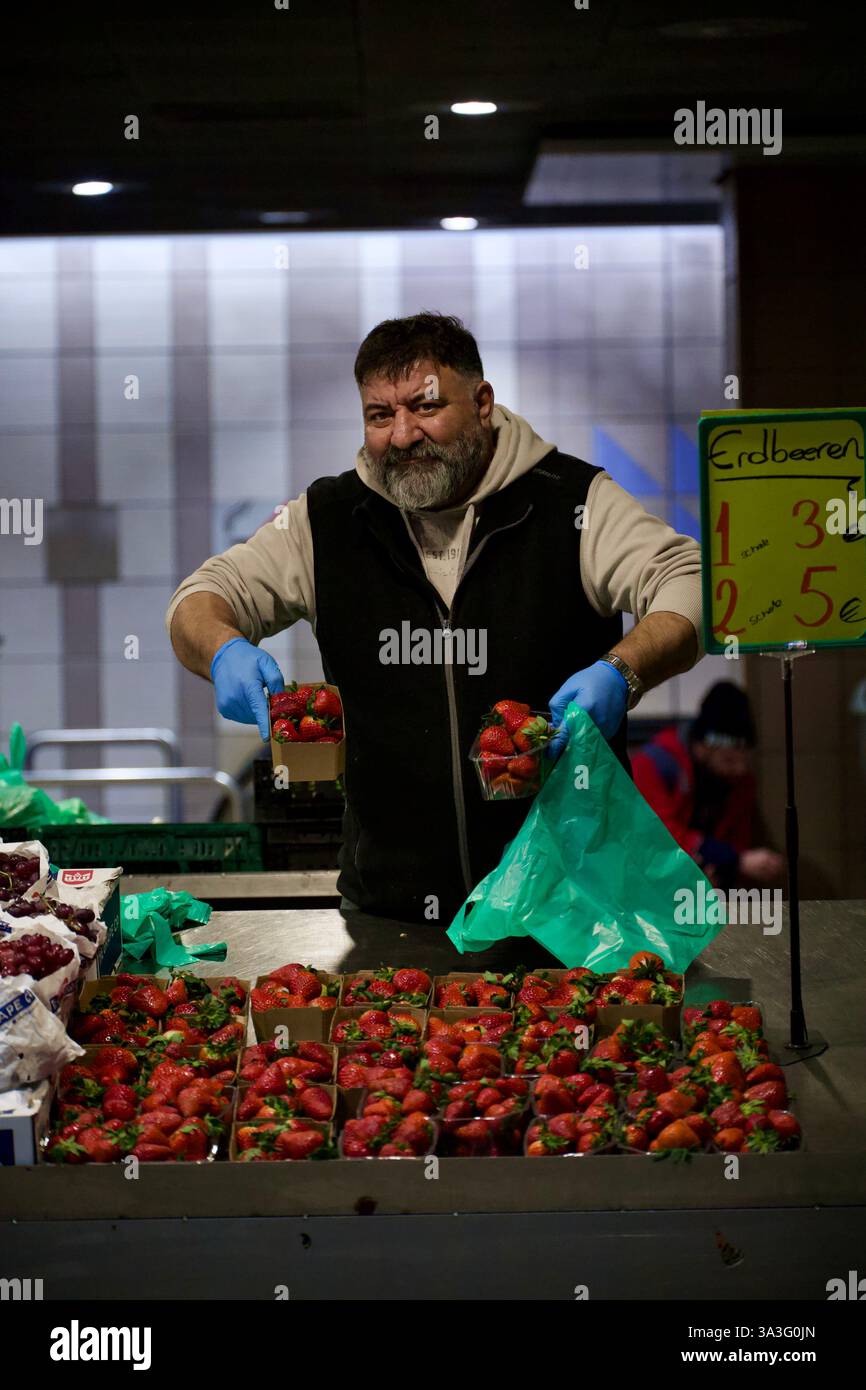 Frankfurt am Main, Germany. March 14, 2025. Strawberry vendor in the ...