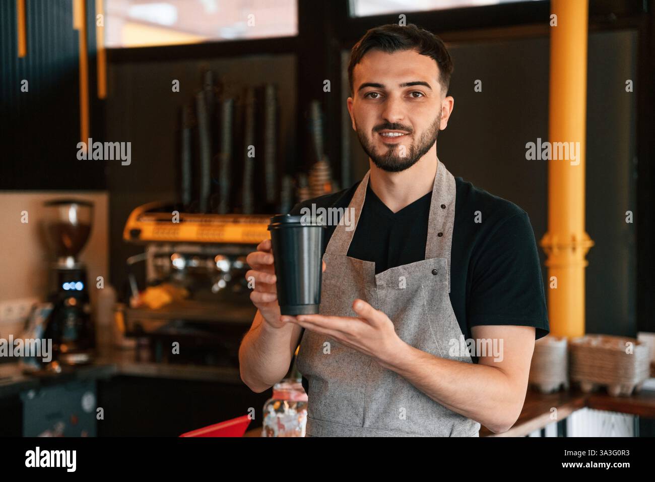 Man is serving delicious street food Stock Photo - Alamy