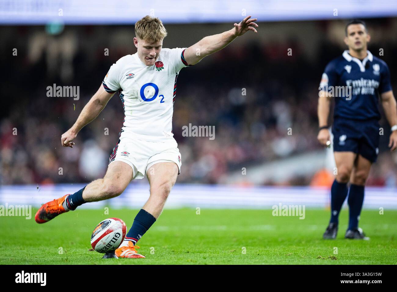 Fin Smith of England kicks a conversion during the 2025 Six Nations ...
