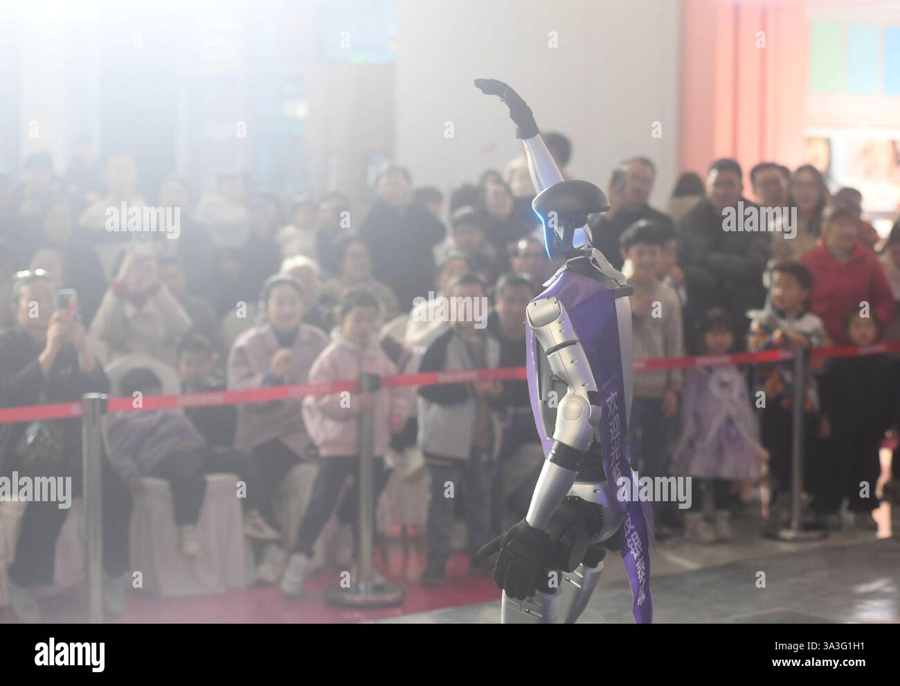 Hangzhou, China. 15th Mar, 2025. A Unitree G1 humanoid robot performs ...