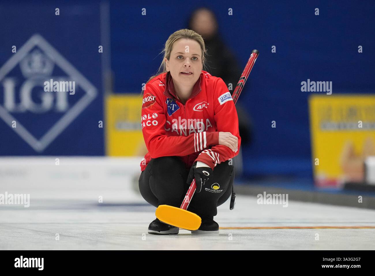 Canada's Tracy Fleury, reacts after she releases the stone during a ...