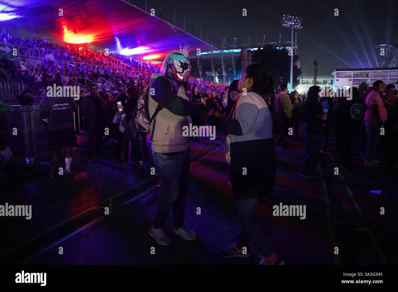 Music fans dance as the Mexican cumbia band Los Angeles Azules performs ...