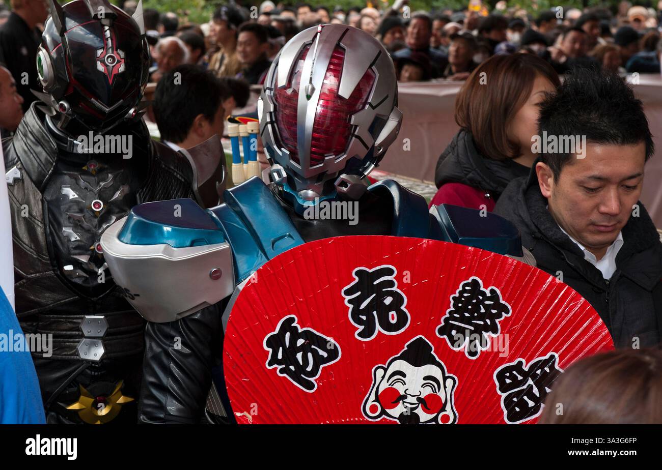 Japanese super hero cosplay fantasy in helmet and costume appears at an ...