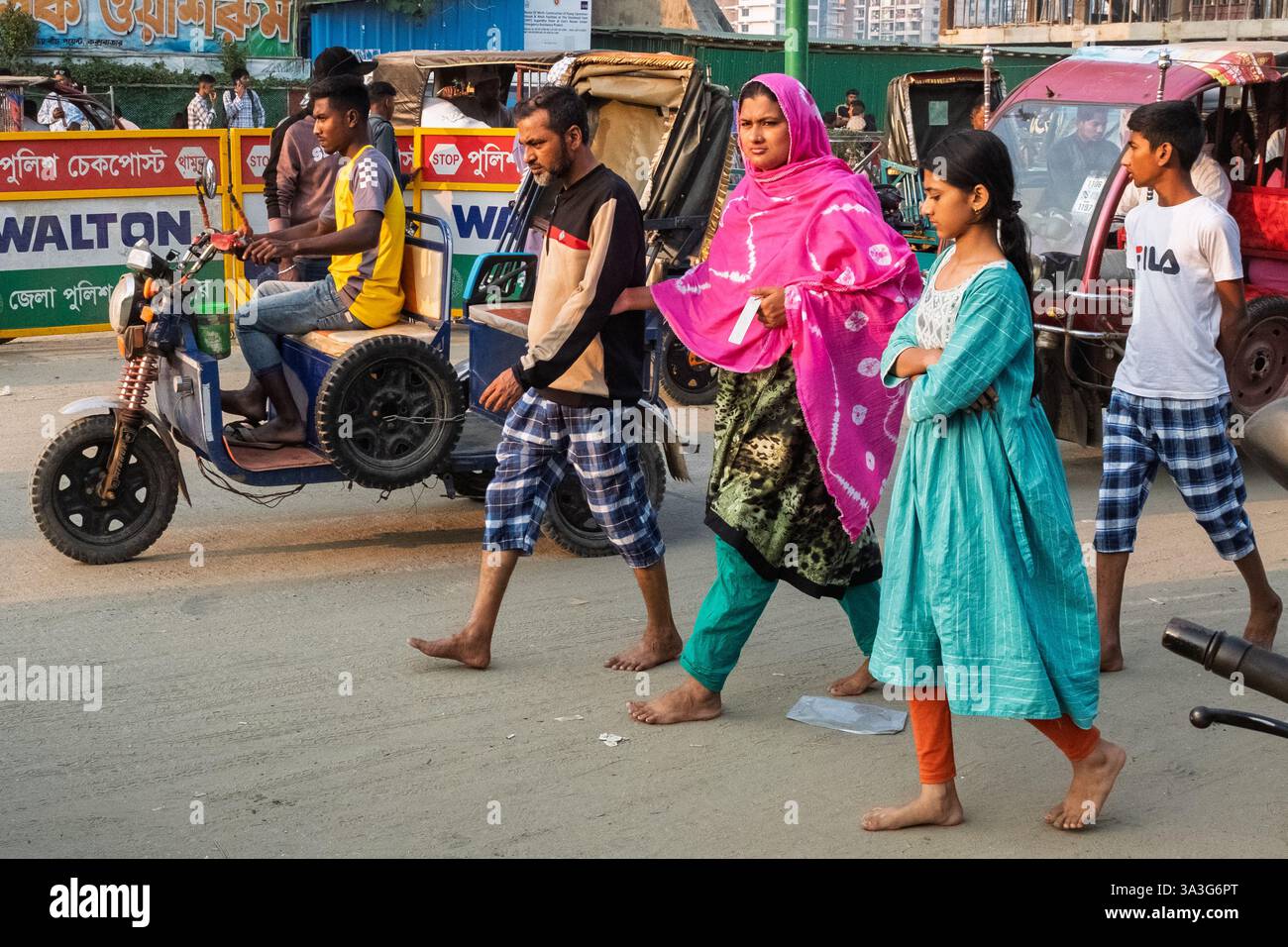 Hindu family walking, Cox's Bazar, Bangladesh Stock Photo - Alamy