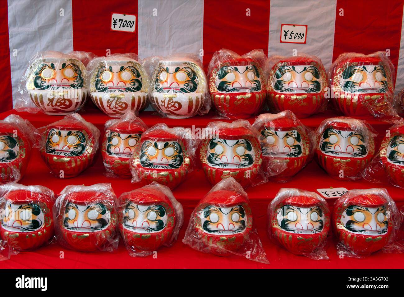 Red Daruma doll modeled after Bodhidharma is seen as a symbol of ...
