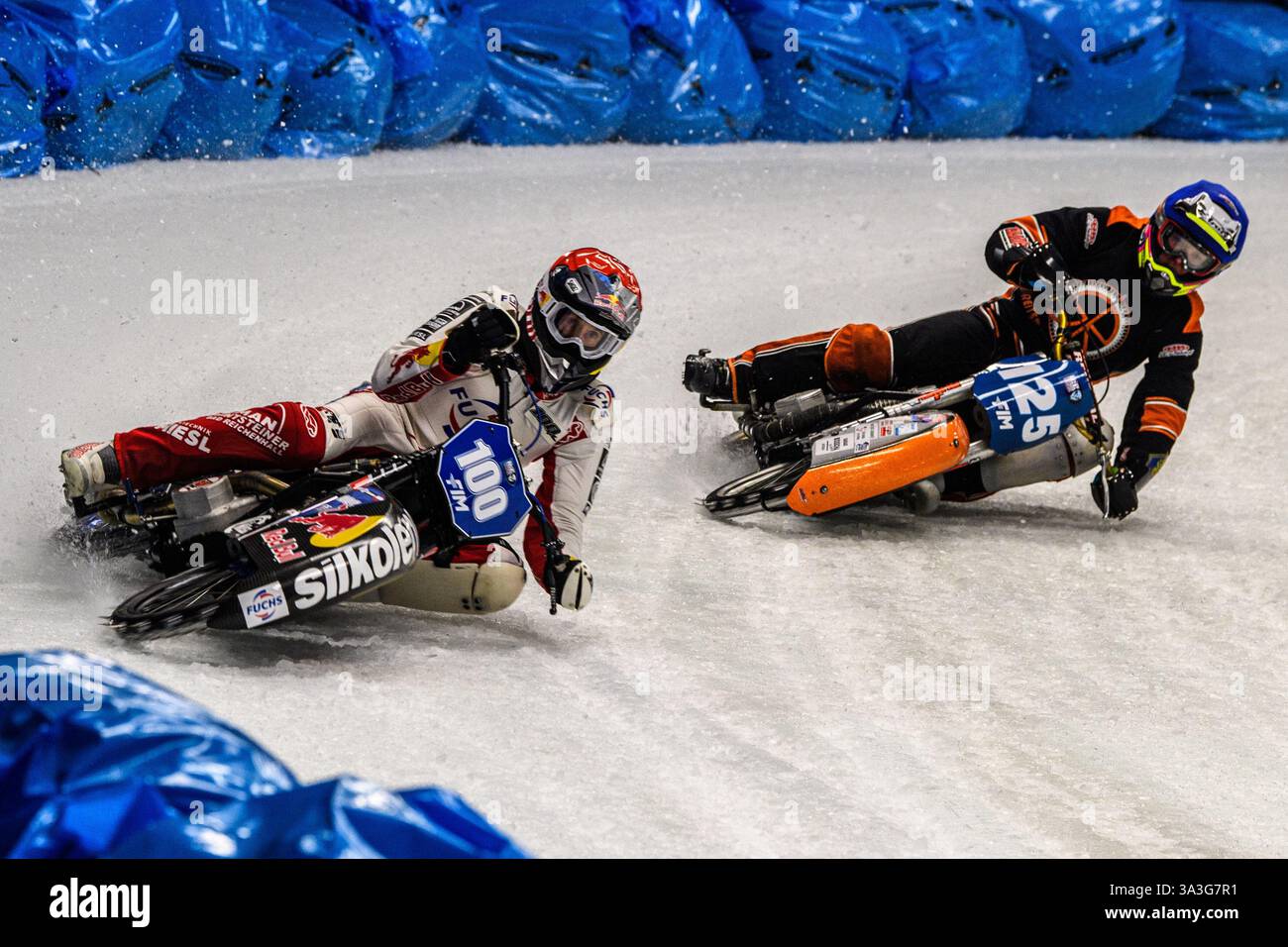 Franky Zorn (100) of Austria in Red leading Sebastian Reitsma (125) of ...