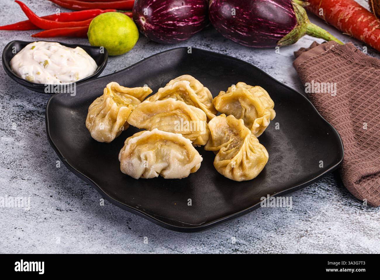 Steamed Nepali traditional Momo stuffed dumplings Stock Photo - Alamy