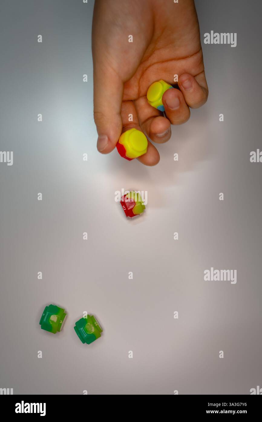 Korean traditional game kit Gonggi. Colourful plastic stones on the ...