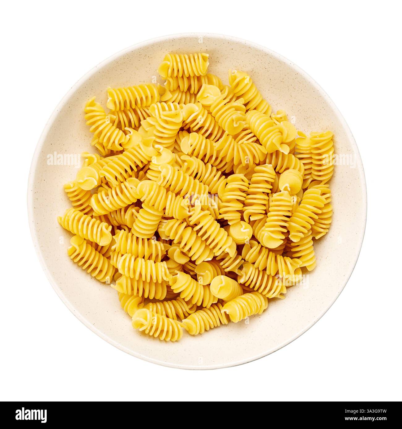 Pasta close-up. Fusilli spirale in a bowl, isolated on white background ...