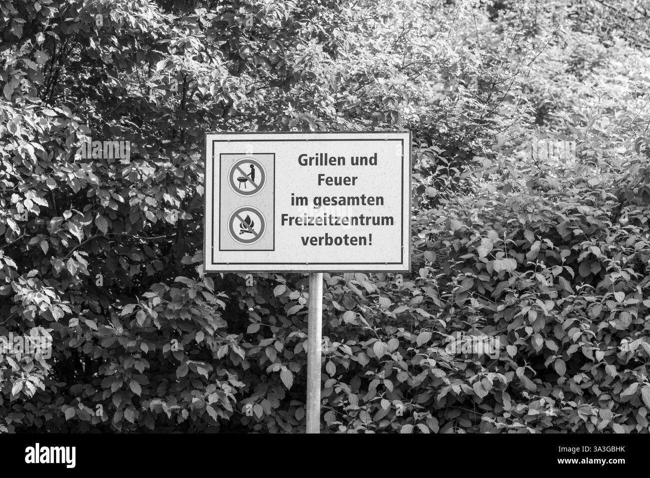 Warning notice concept white Black and White Stock Photos & Images - Alamy