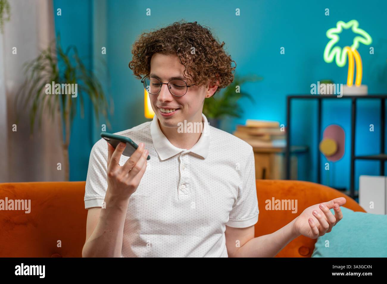 Happy Caucasian man making phone call conversation with friends at ...