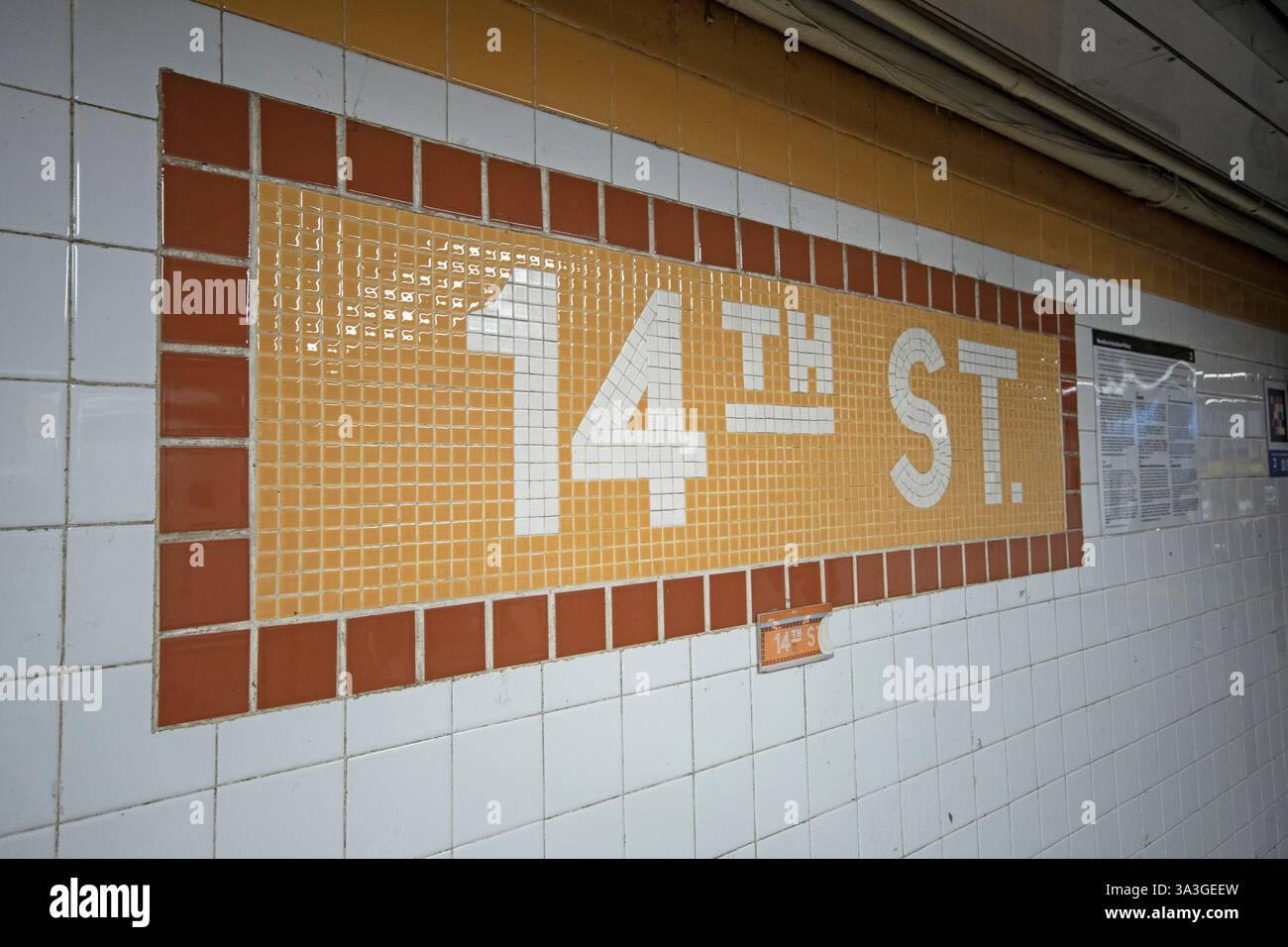 Tiled wall at the 14th Street metro station in Manhattan, New York City ...