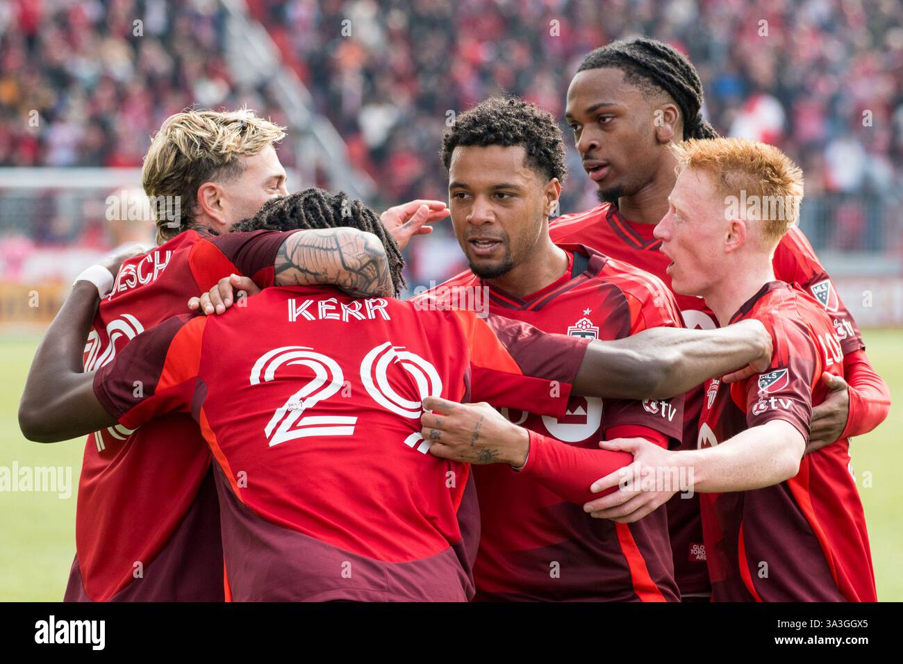 Toronto, Canada. 15th Mar, 2025. Deandre Kerr #29 (C) celebrates with ...