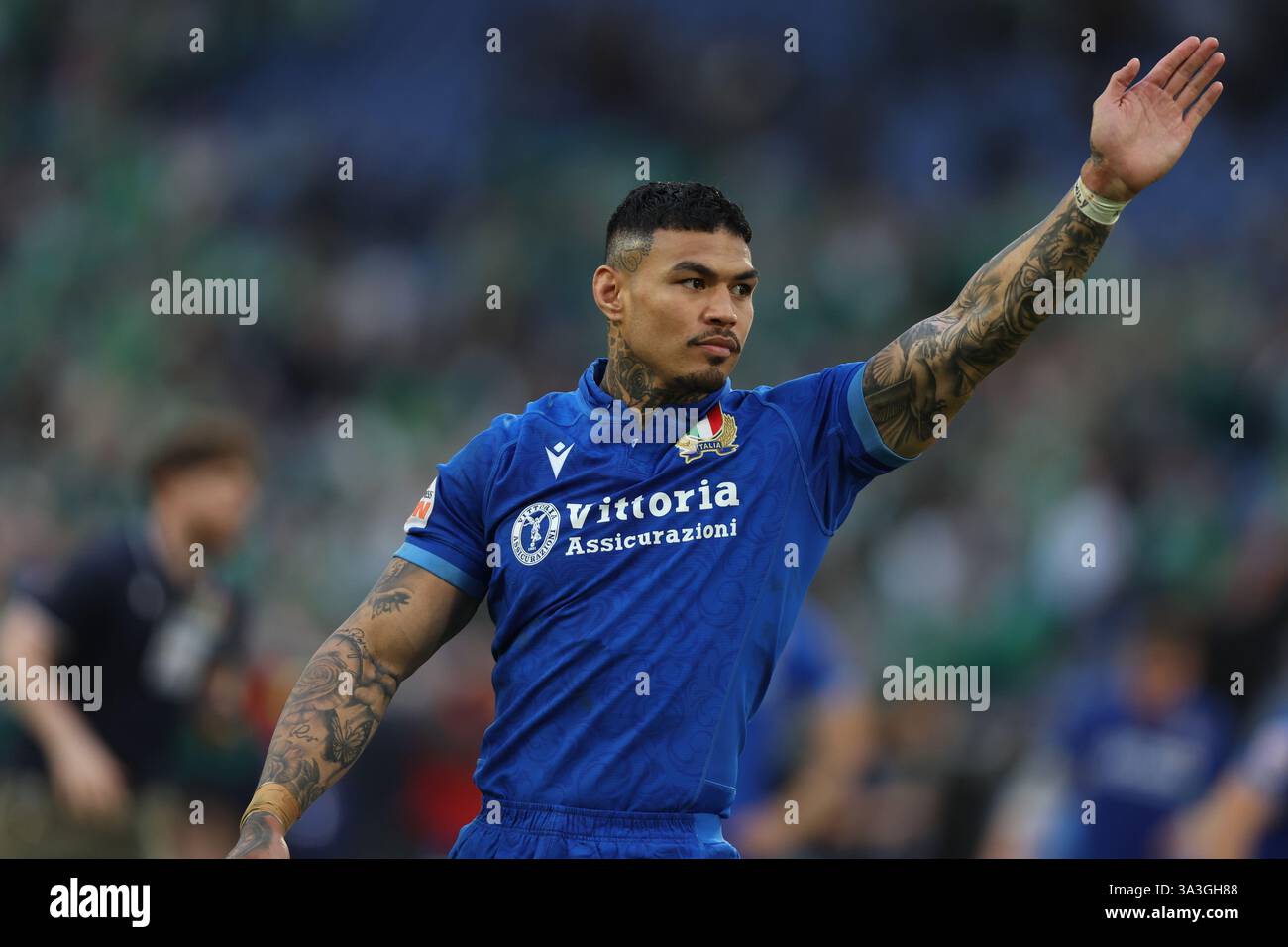 Monty Iaone of Italy greets the fans at end of the M6N Guinness Six ...