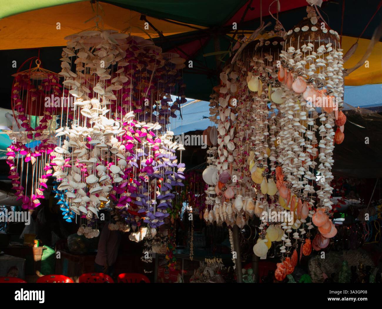 Curios and hangings made of seashells at a local market in Kep ...