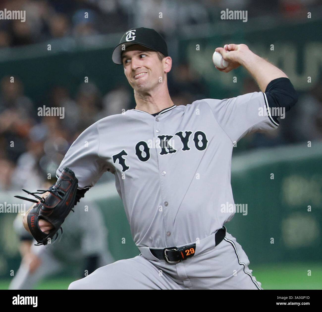 Yomiuri Giants' starting pitcher Foster Griffin pitches in the first ...