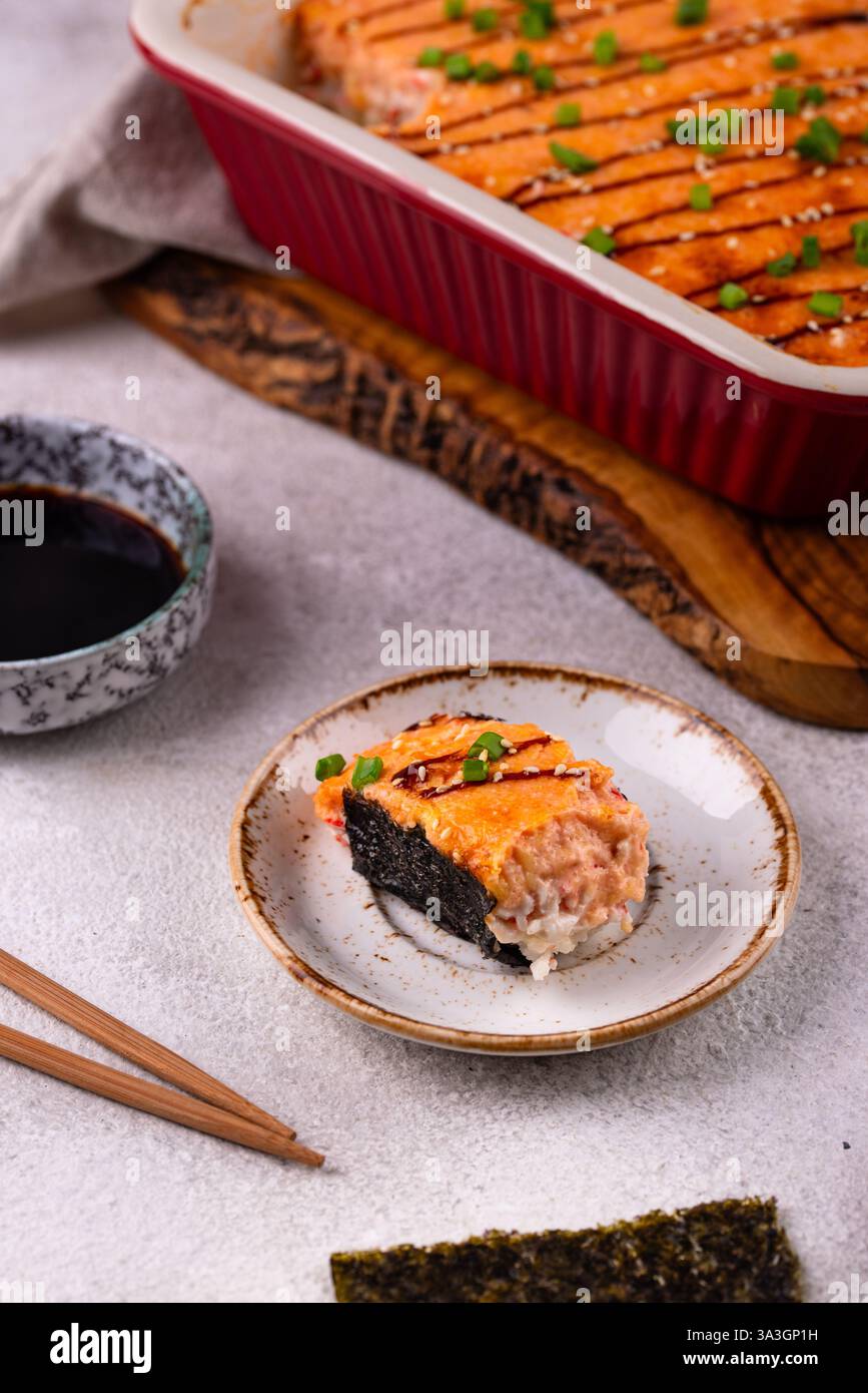 Baked sushi roll cake with crab surimi sticks Stock Photo - Alamy