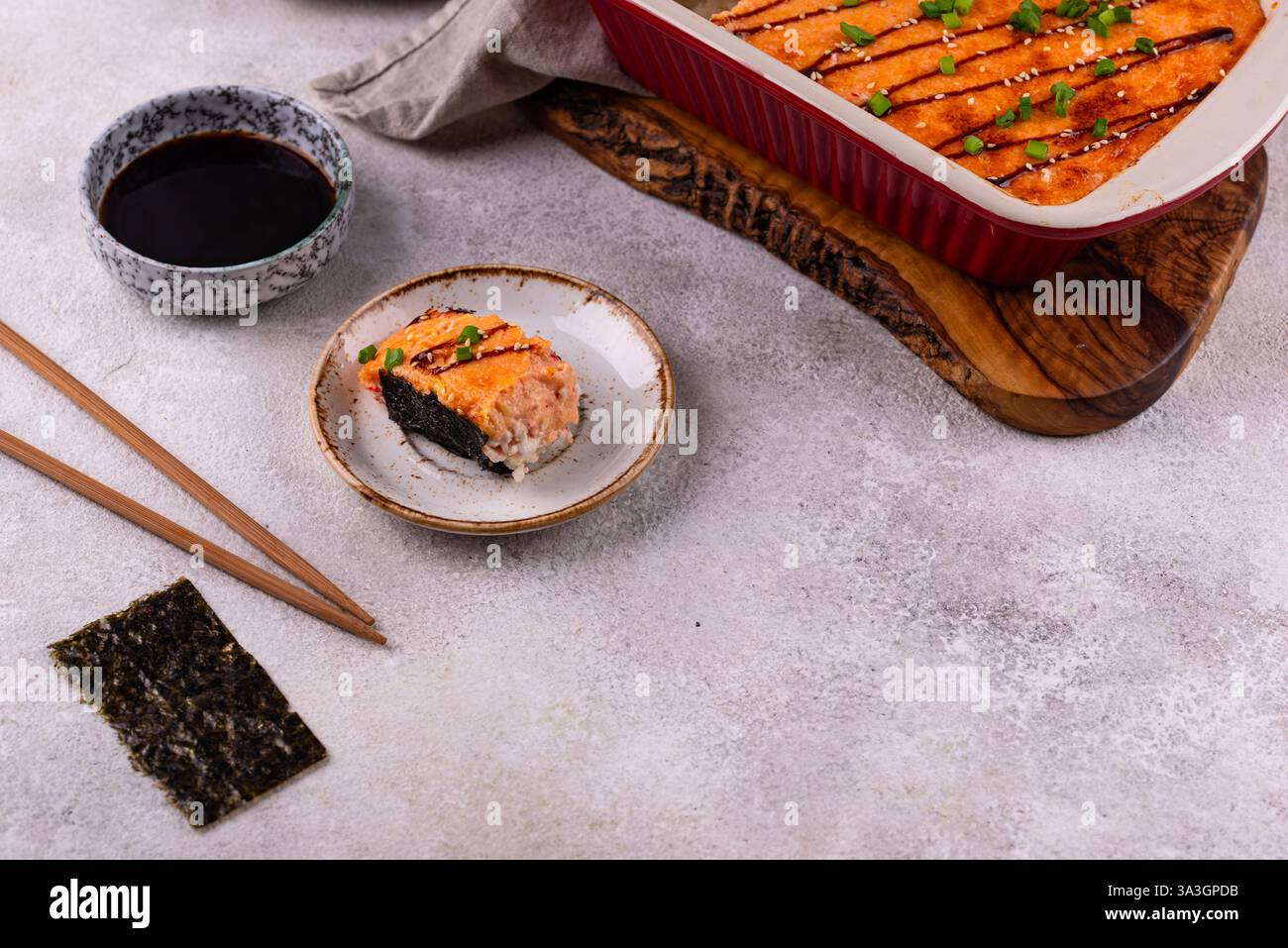 Baked sushi roll cake with crab surimi sticks Stock Photo - Alamy