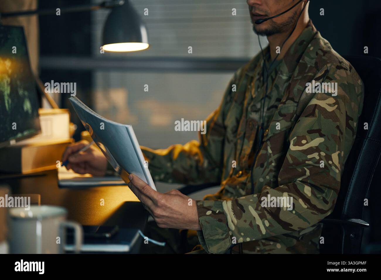 Working on Task in Military Uniform at Office Desk Stock Photo - Alamy