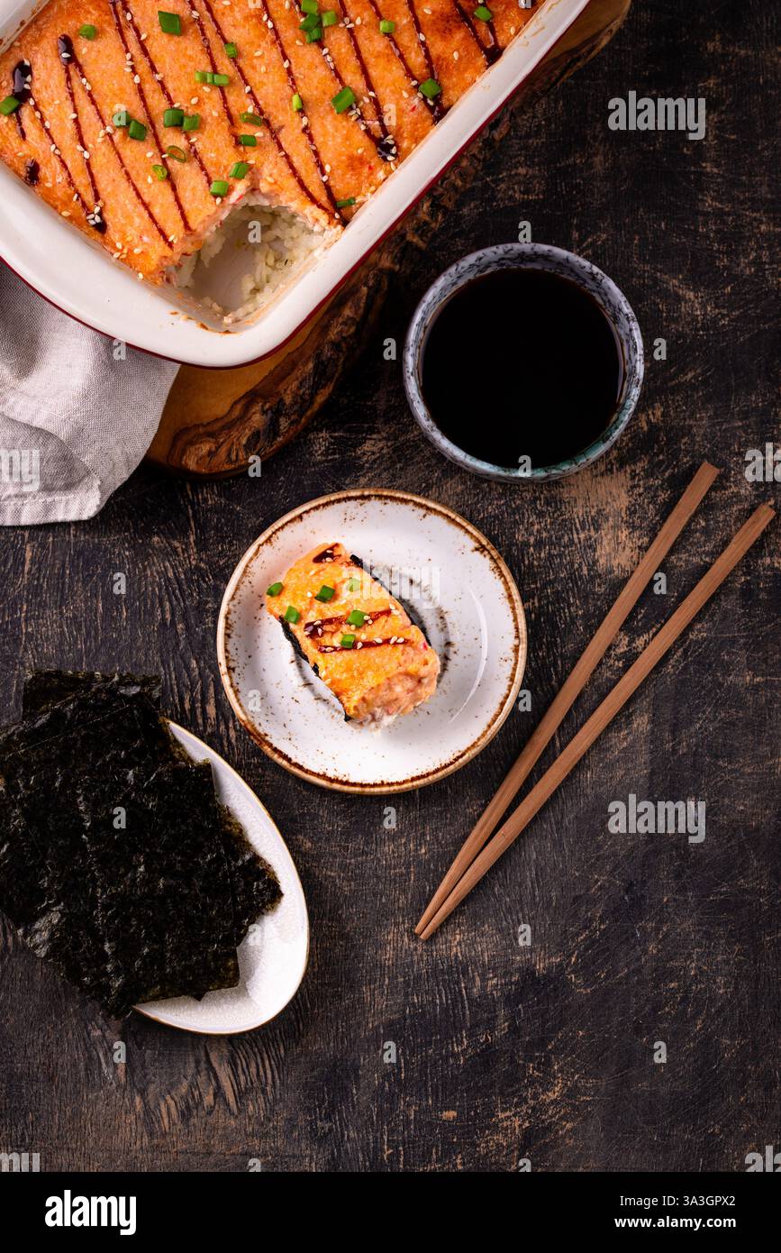 Baked sushi roll cake with crab surimi sticks Stock Photo - Alamy