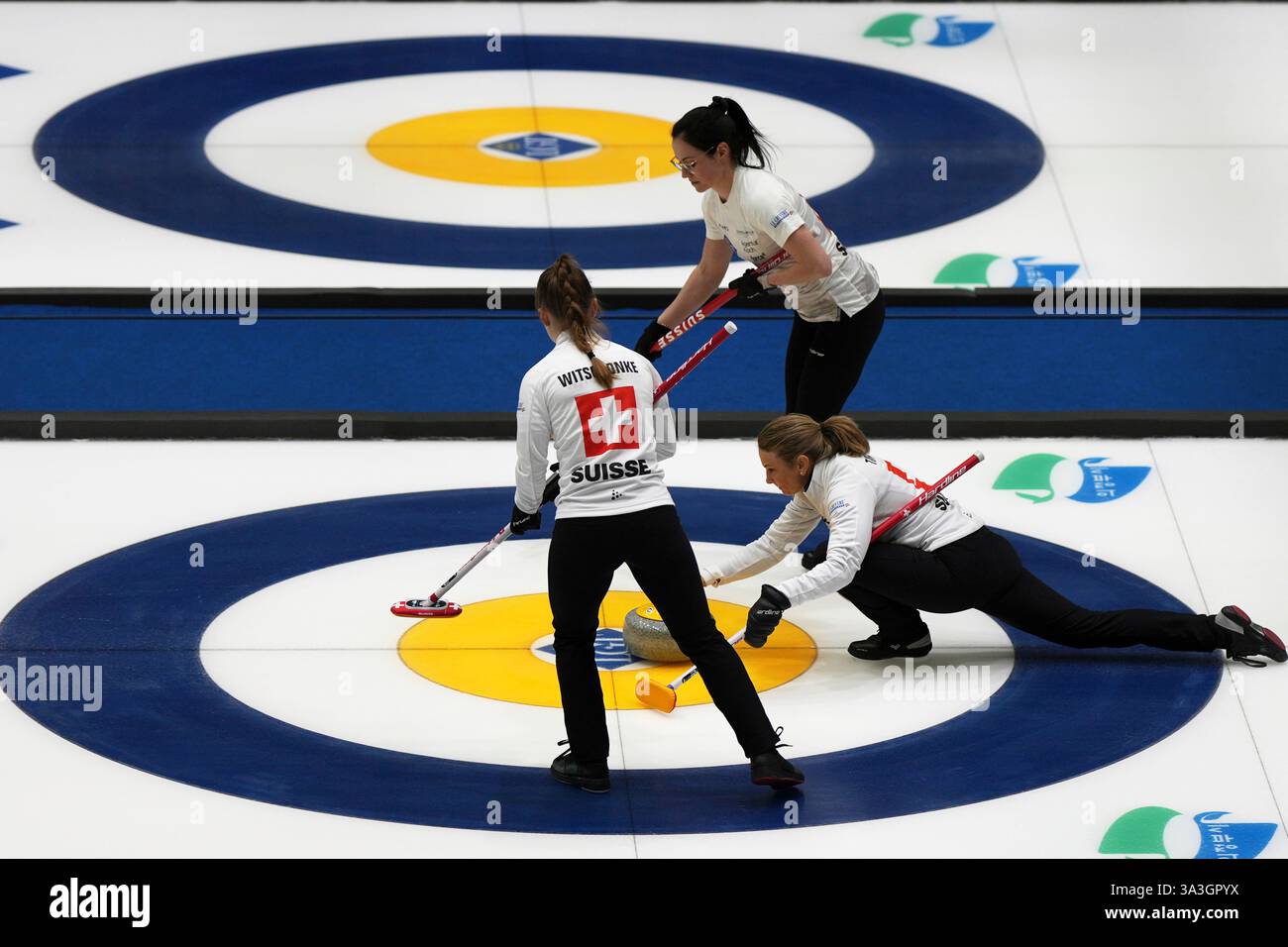 Switzerland's skip Silvana Tirinzoni releases the stone during a match ...