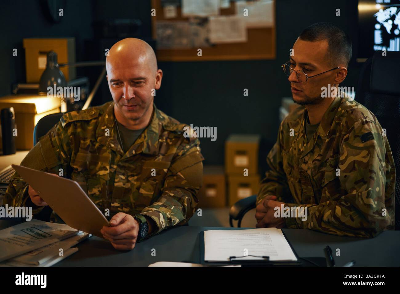 Planning strategy military personnel discussing hi-res stock ...
