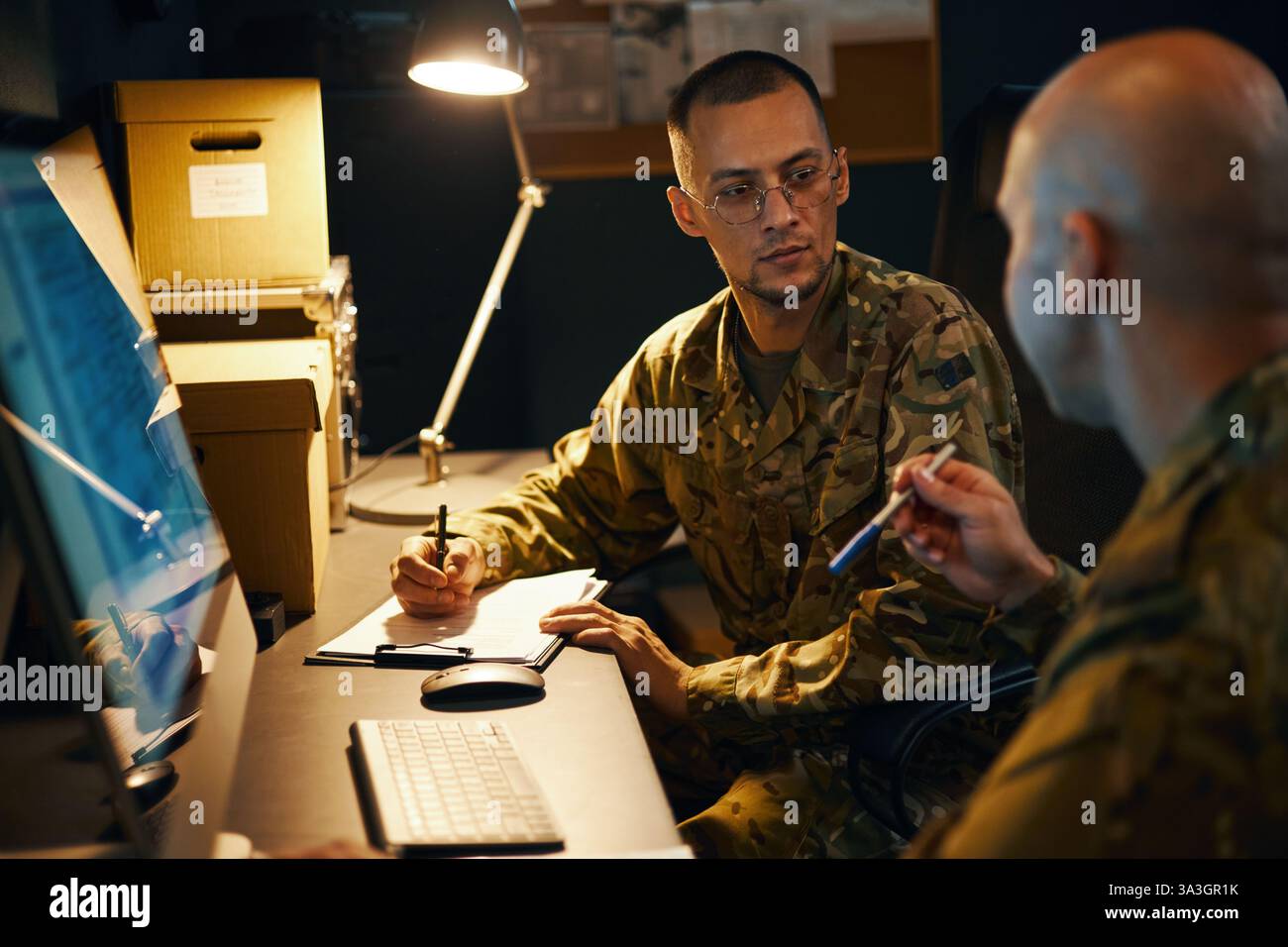 Military Officers Collaborating in Command Center Stock Photo - Alamy